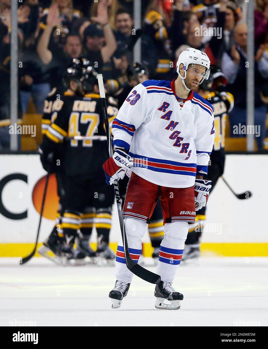 New York Rangers' Dominic Moore (28) skates away as the Boston Bruins ...