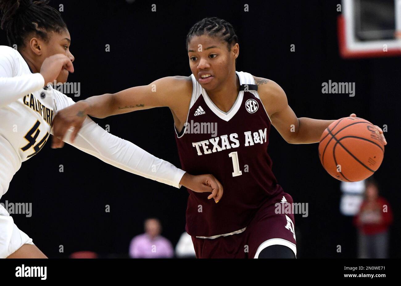 Texas A&M's Courtney Williams (1) drives the ball against California's ...
