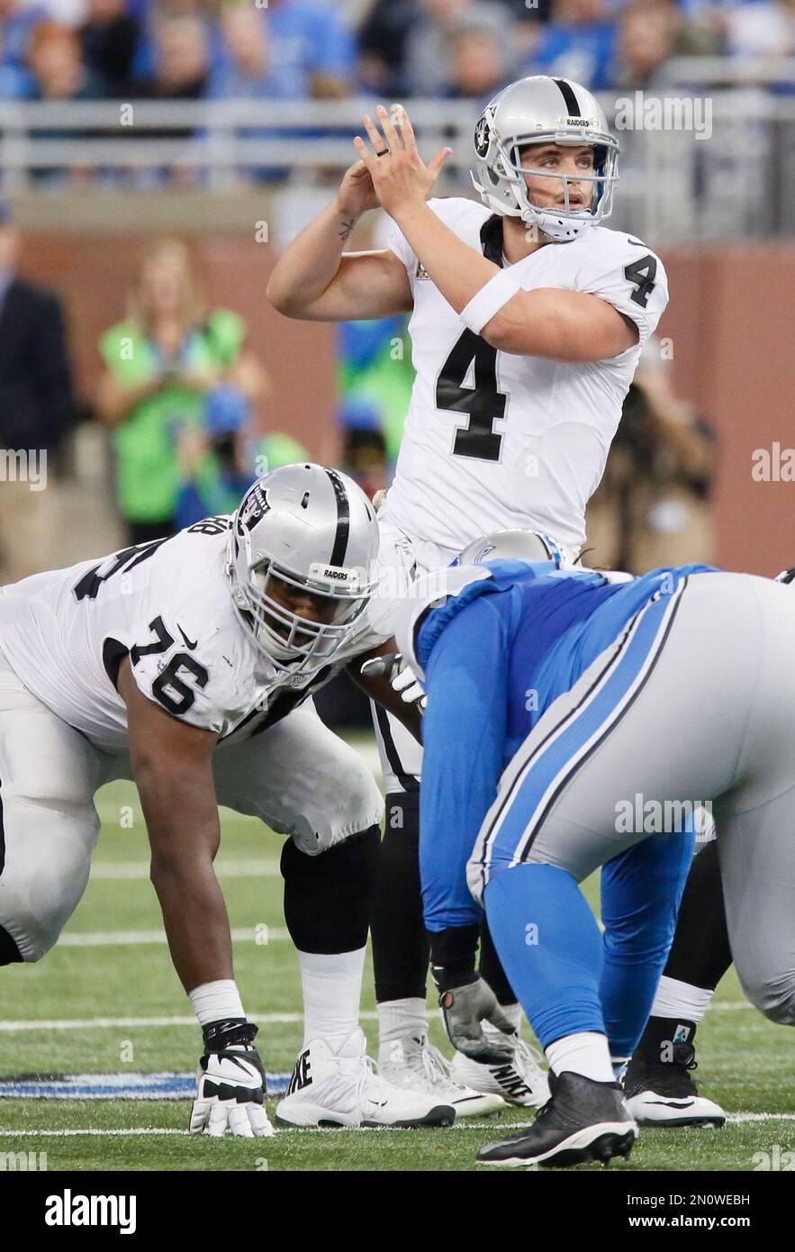 Oakland Raiders quarterback Derek Carr (4) signals a timeout during the ...