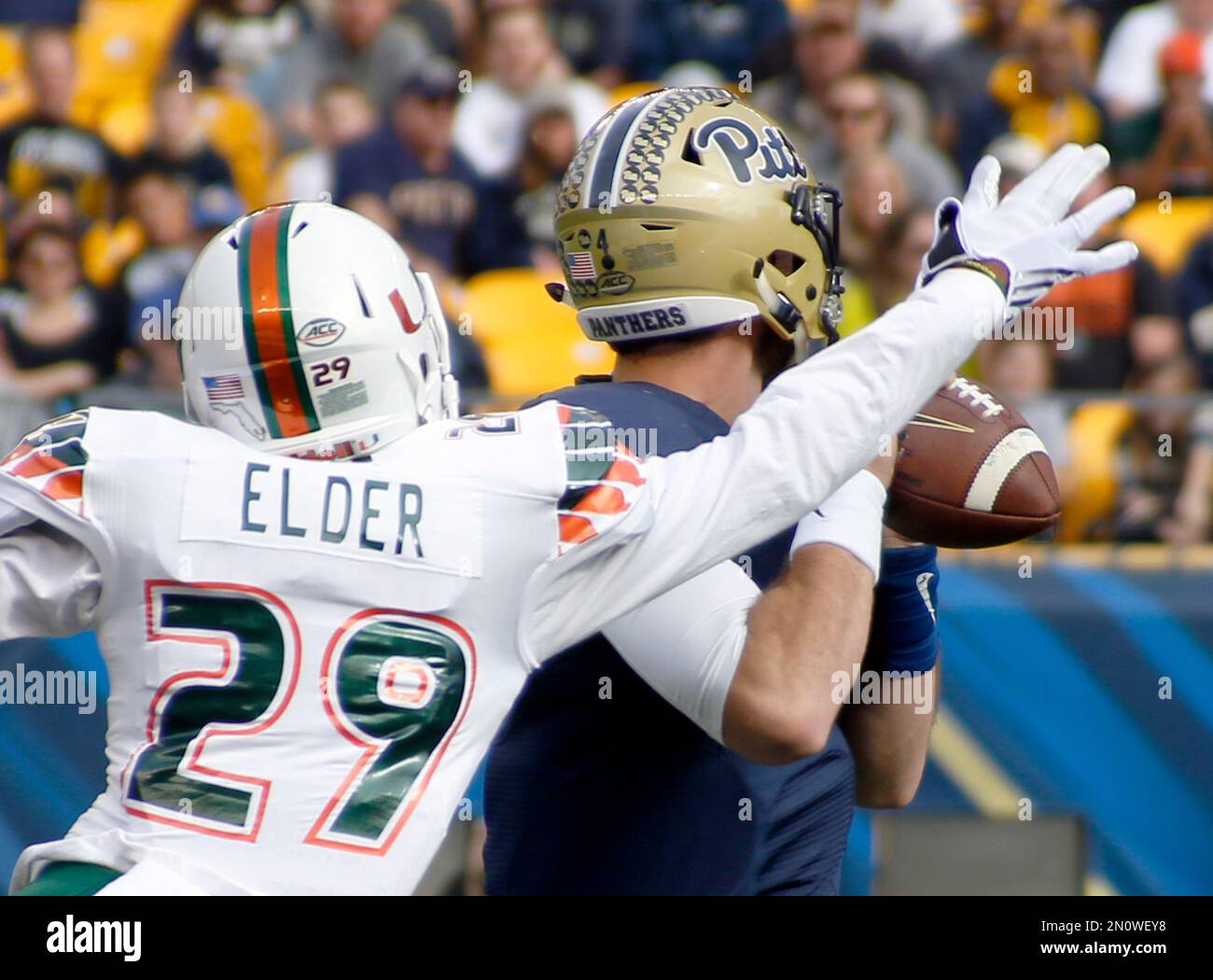 Miami defensive back Corn Elder (29) sacks Pittsburgh quarterback ...