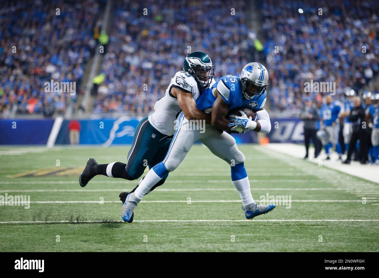 Detroit Lions running back Theo Riddick (25) is tackled by Philadelphia ...