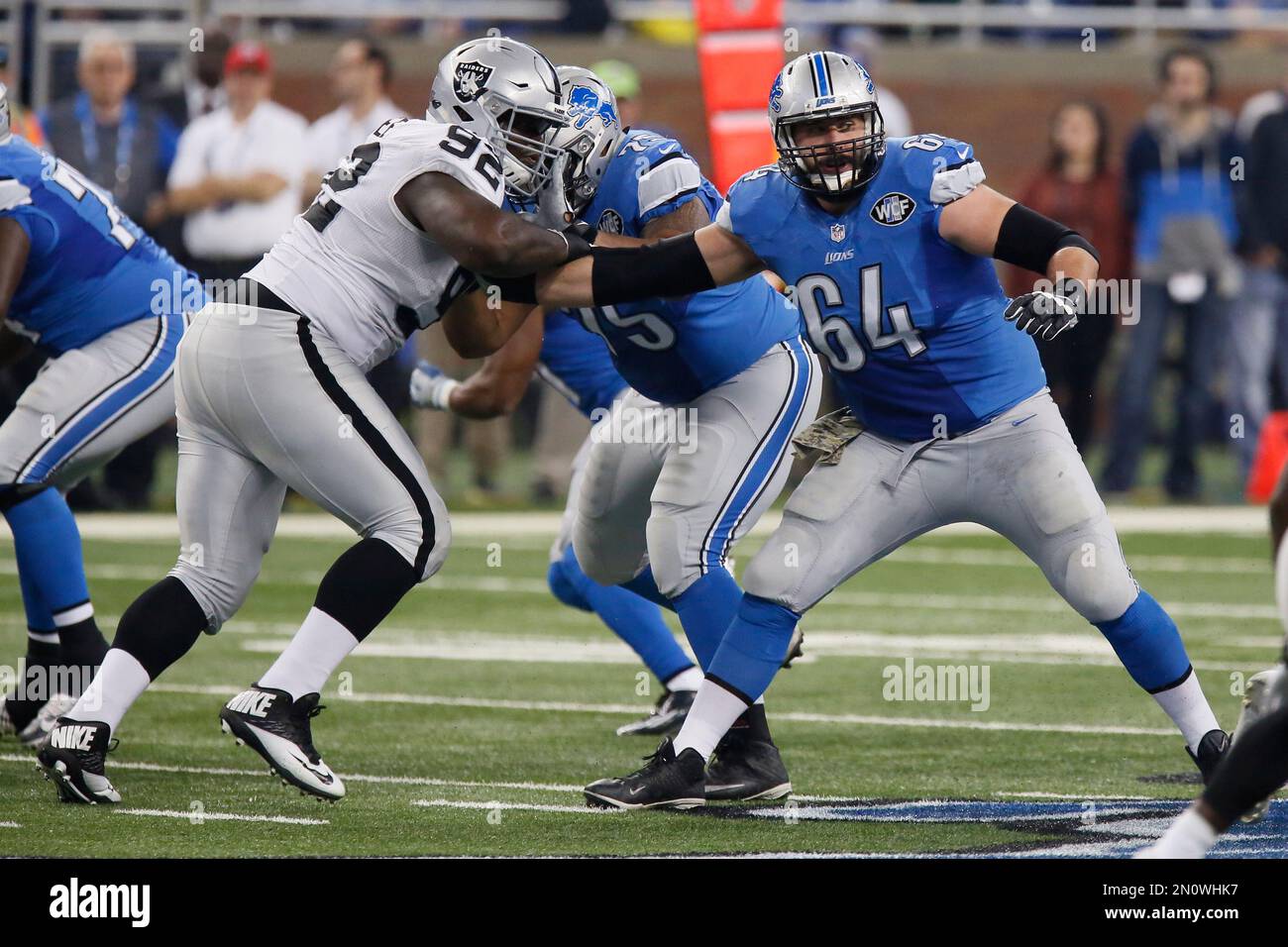 Detroit Lions center Travis Swanson (64) blocks against Oakland Raiders ...