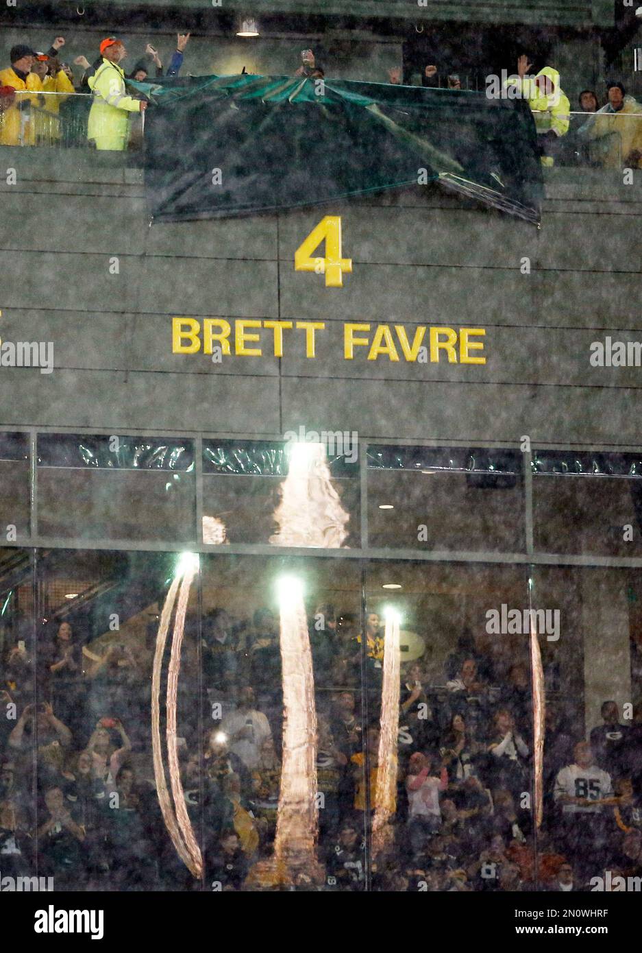 Brett Favre's retired No. 4 and name were unveiled inside Lambeau Field ...