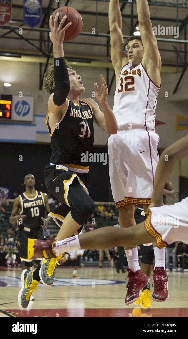 Wichita State guard Ron Baker (31) shoots against USC forward Nikola ...