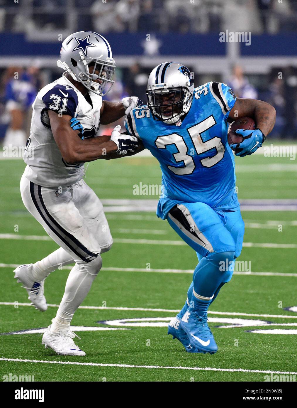 Dallas Cowboys' Byron Jones (31) attempts to stop Carolina Panthers ...