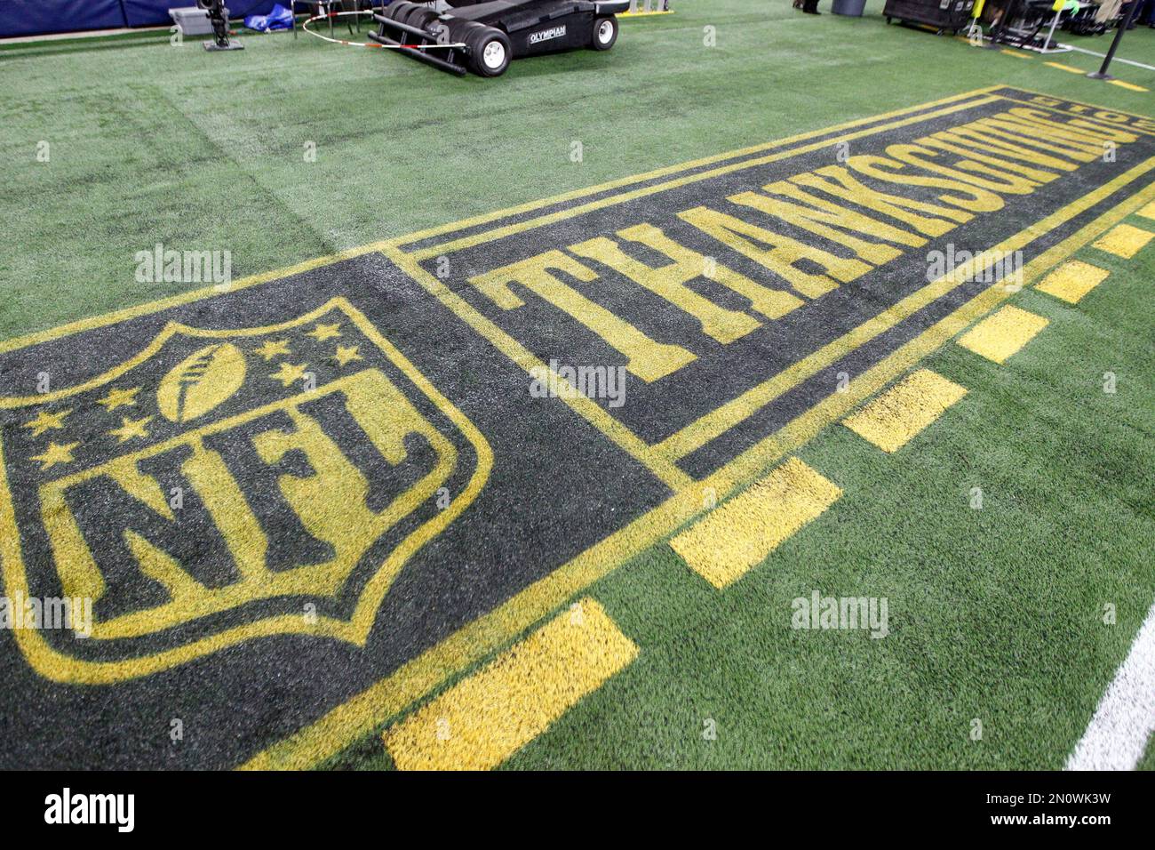 The NFL Thanksgiving logo is seen on the sideline of the field before ...