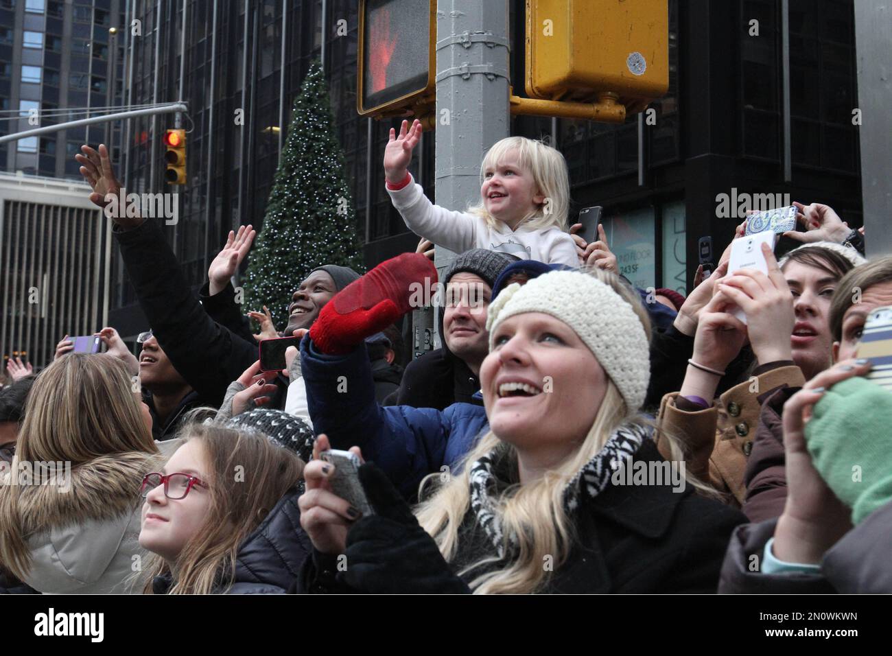 Heidi Bomboy, 4, center, on the shoulders of her dad Justin Bomboy ...