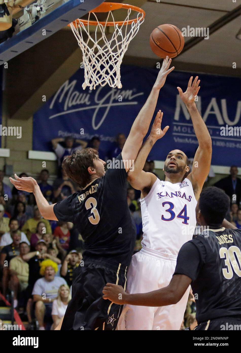 Kansas forward Perry Ellis (34) shoots as Vanderbilt forward Luke ...