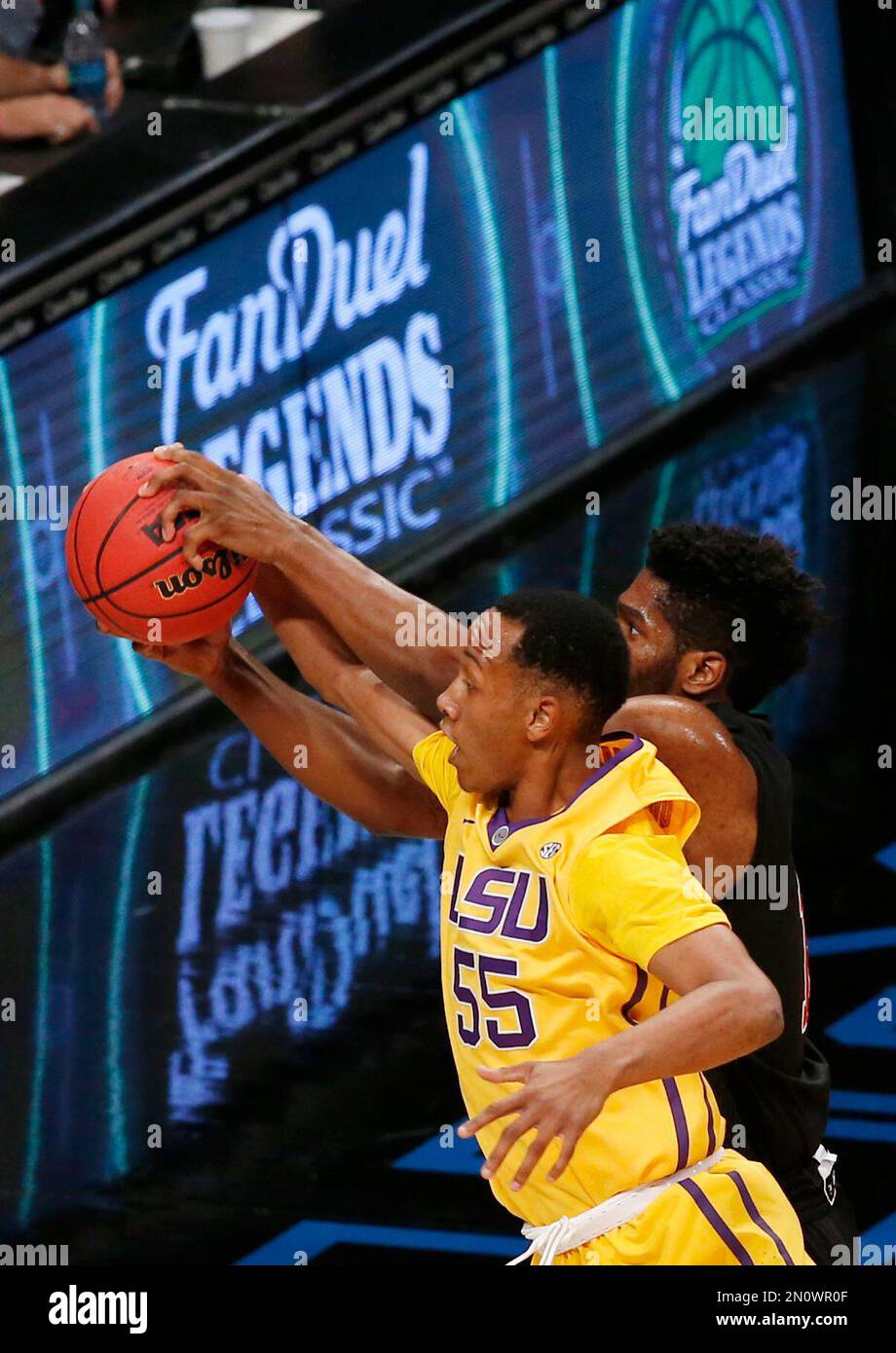 LSU guard Tim Quarterman (55) and a North Carolina player battle for ...