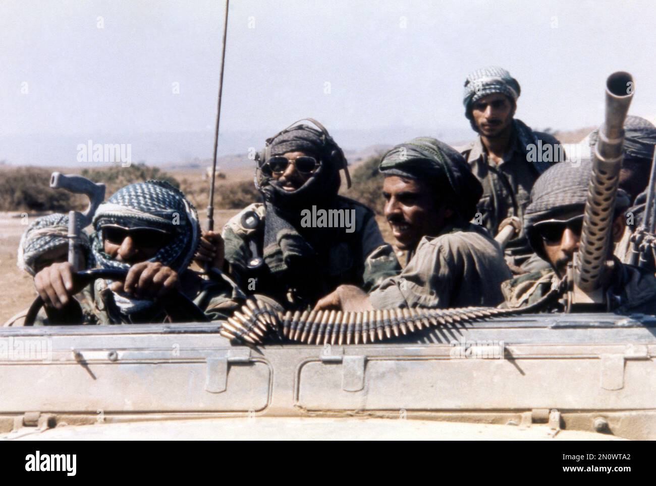 Troops of the Sultan of Oman, with machine guns mounted on their Land ...