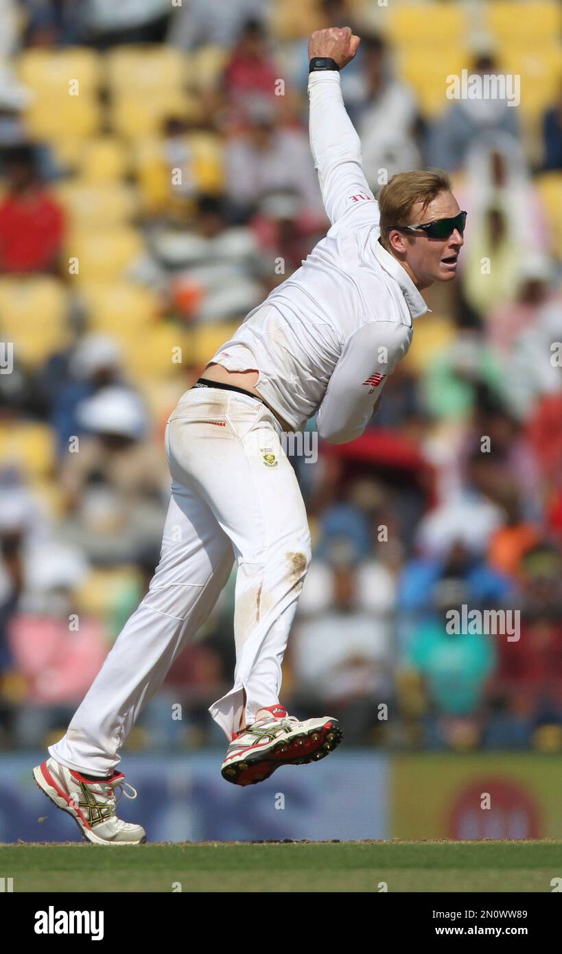 South African bowler Simon Harmer bowls against India on the first day ...