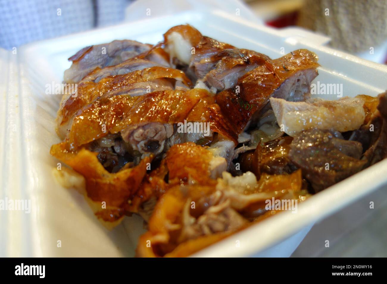 This Oct. 15, 2015 photo shows roasted goose from a food stall in ...