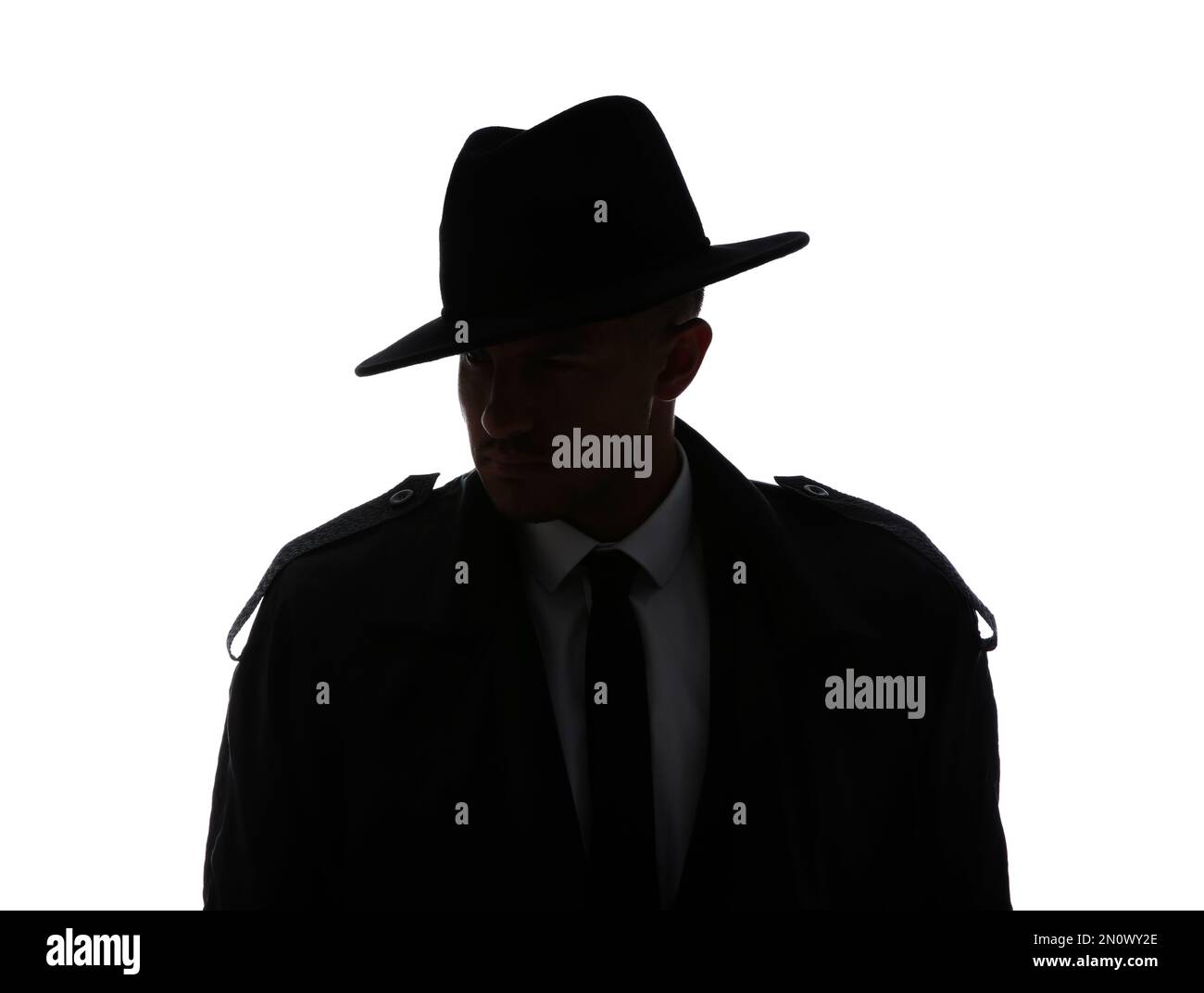 Old fashioned detective in hat on white background Stock Photo - Alamy