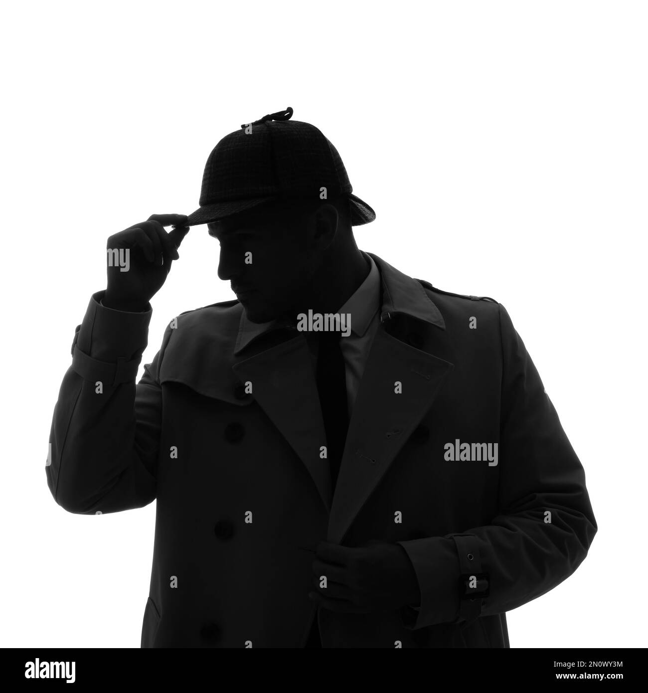 Old fashioned detective in hat on white background Stock Photo - Alamy