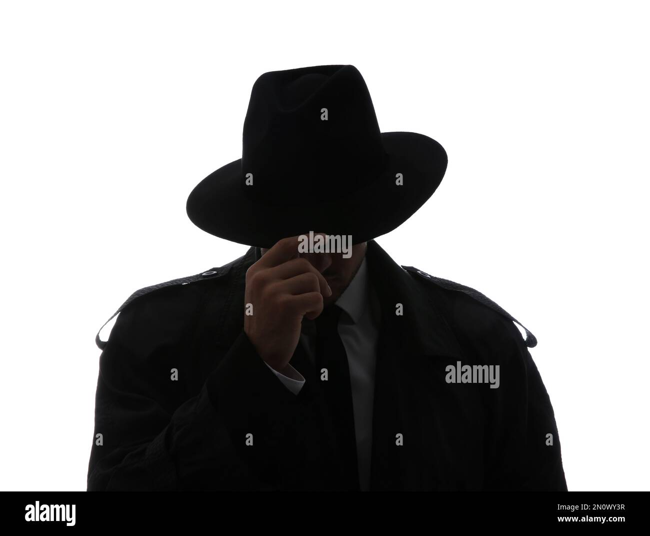 Old fashioned detective in hat on white background Stock Photo - Alamy