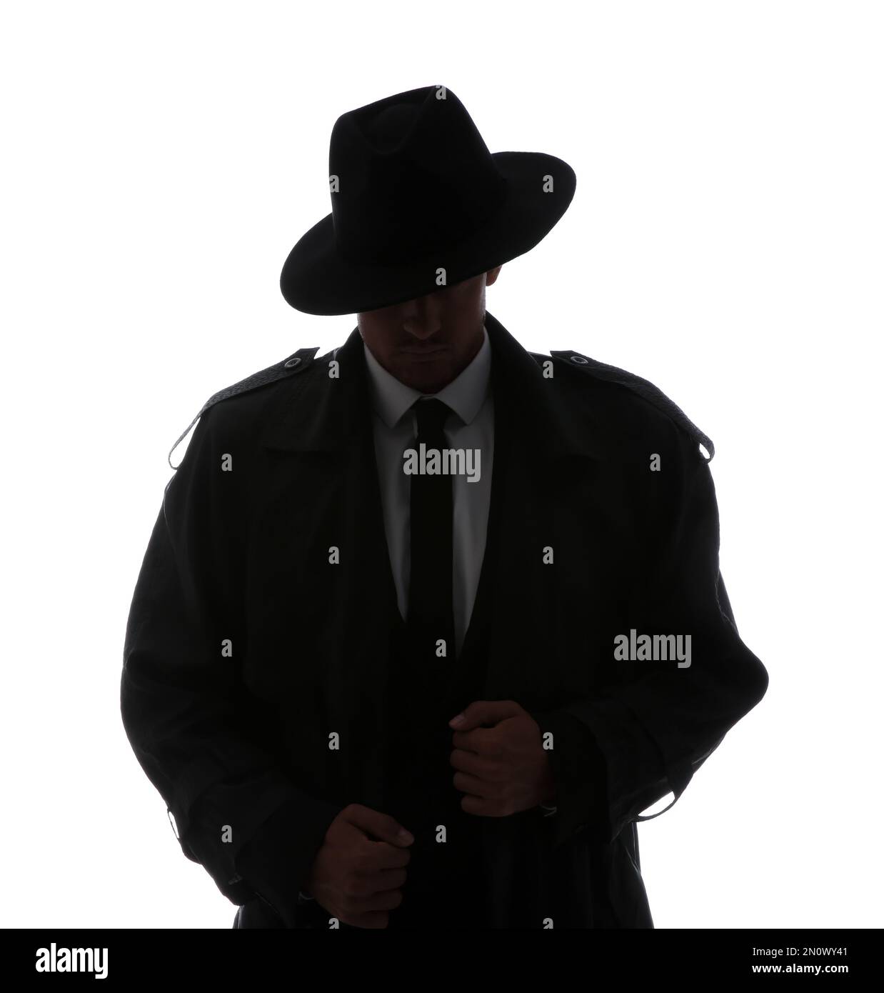 Old fashioned detective in hat on white background Stock Photo - Alamy