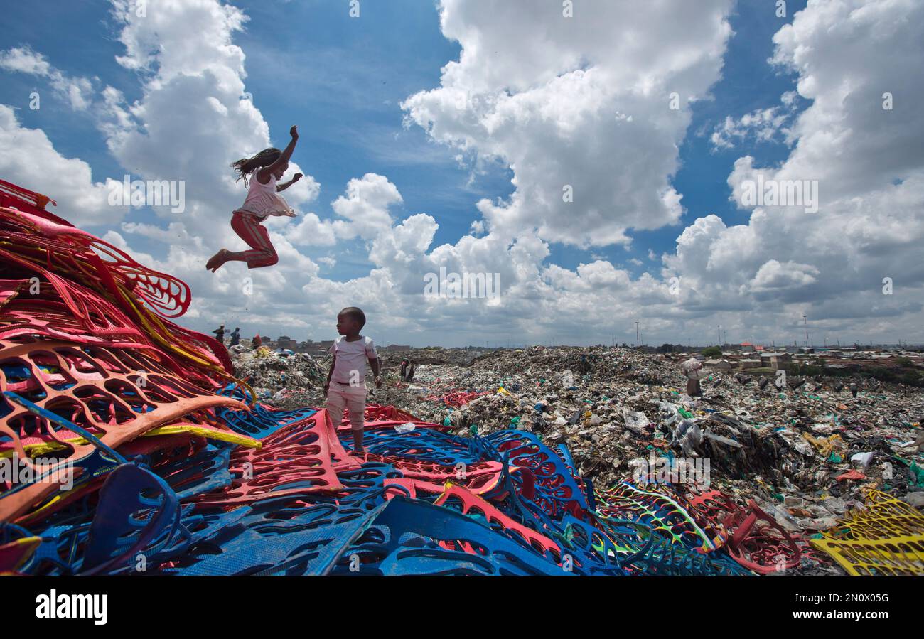 In this photo taken Thursday, Nov. 12, 2015, Joyce Njeri, 8, enjoys a ...