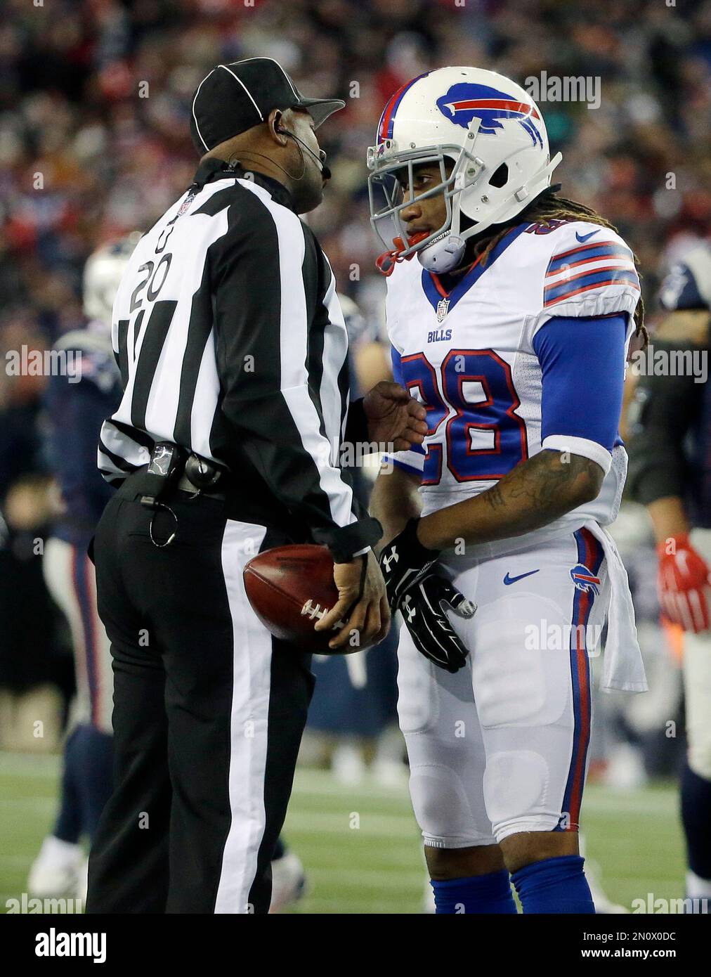 Umpire Barry Anderson speaks with Buffalo Bills defensive back Ronald ...