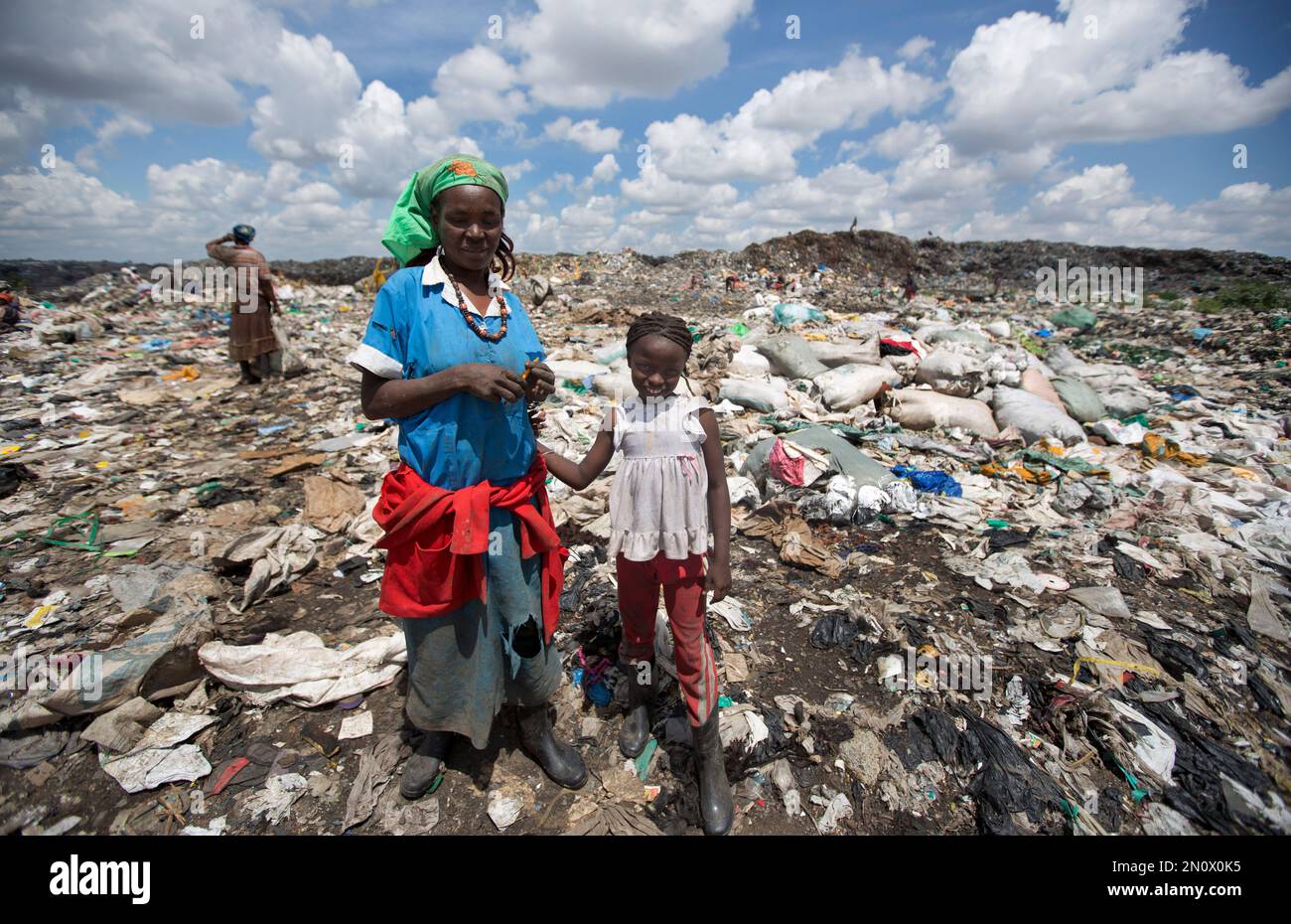 In this photo taken Thursday, Nov. 12, 2015, Joyce Njeri, 8, stands ...