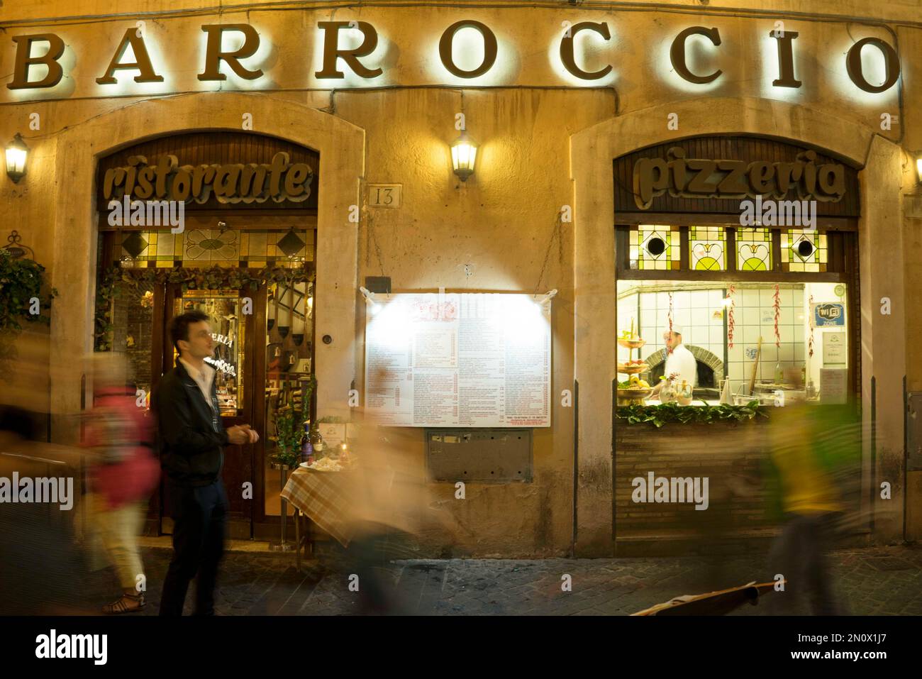 In this photo taken on Nov. 13, 2015, people walk by the Barroccio ...