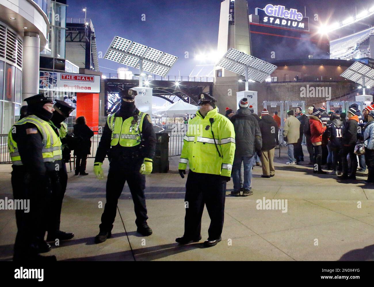Law enforcement officers stand outside Gillette Stadium before an NFL ...