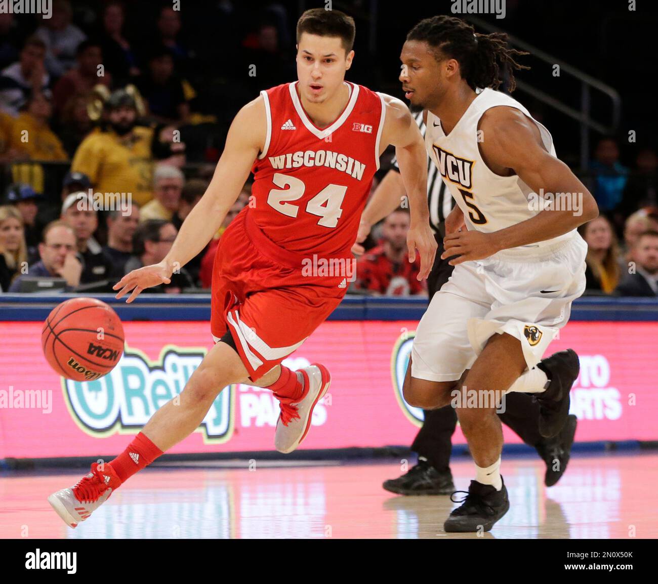 Wisconsin guard Bronson Koenig (24) drives against Virginia ...