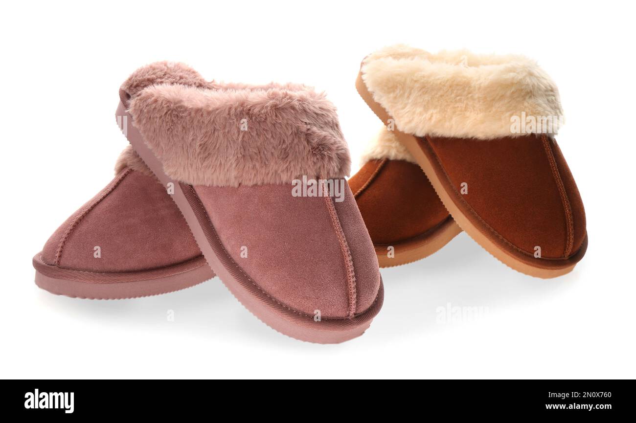 Different stylish soft slippers on white background Stock Photo - Alamy