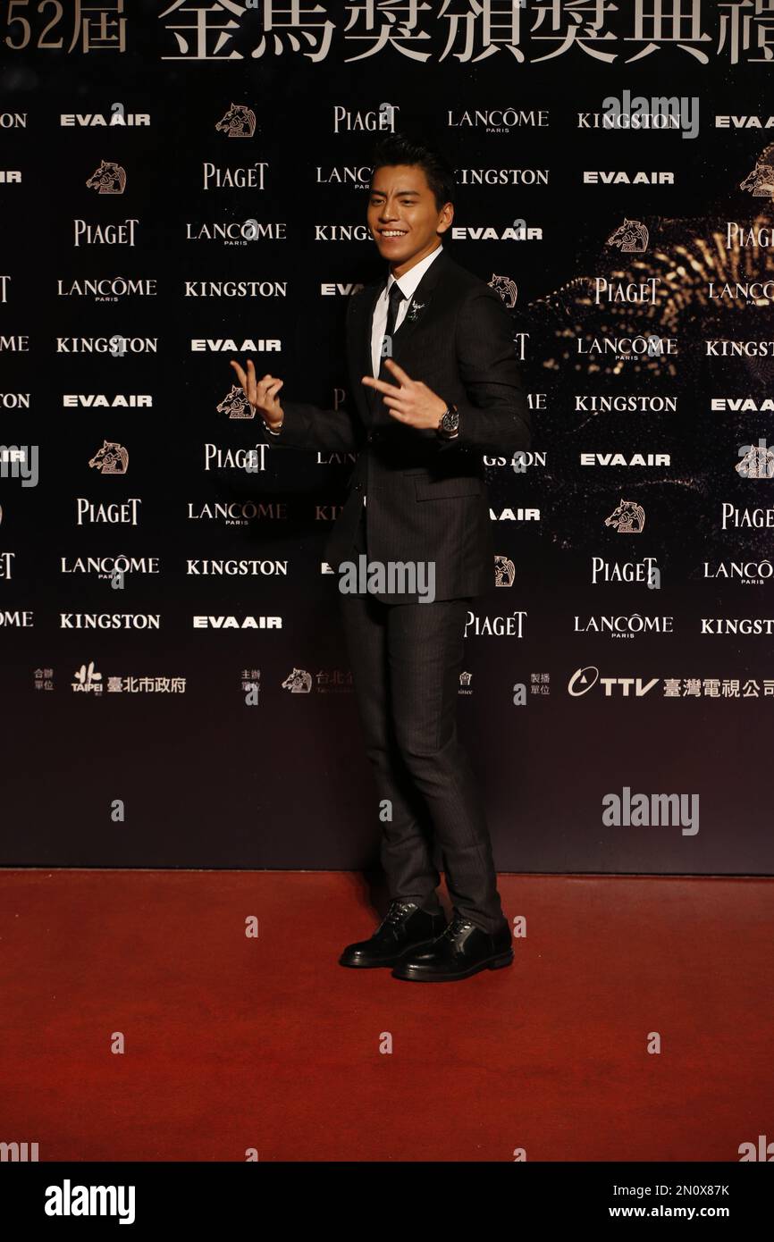 Taiwanese actor Darren Wang poses on the red carpet at the 52nd Golden ...