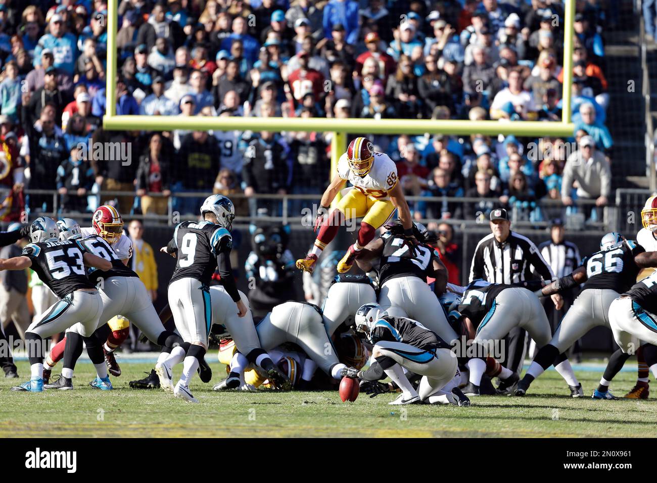 Washington Redskins' Derek Carrier (89) leaps across the line in an ...