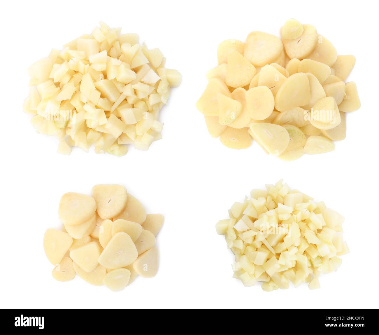 Set of cut garlic on white background, top view Stock Photo - Alamy