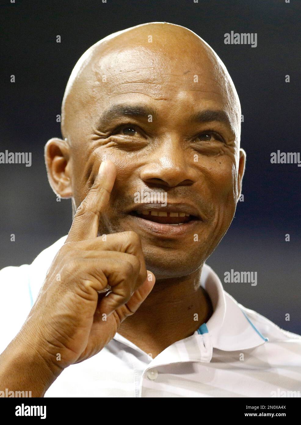 Former MLB pitcher Orlando "El Duque" Hernandez, walks on the field ...