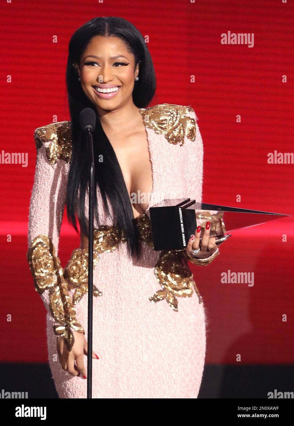 Nicki Minaj accepts the award for for best rap/hip-hop artist at the ...