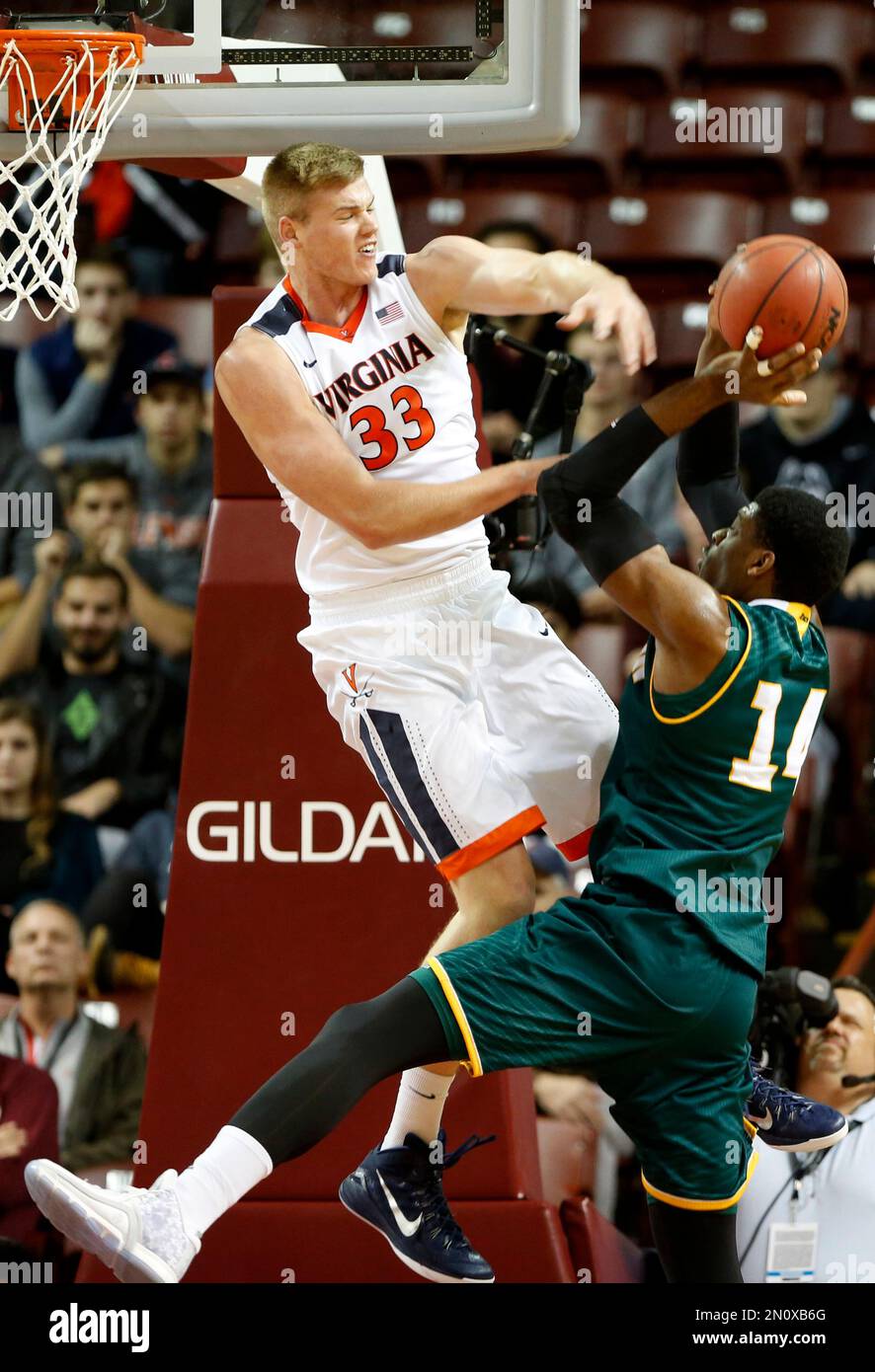 Virginia's Jack Salt (33) attempts to blocks as George Mason's Shevon ...