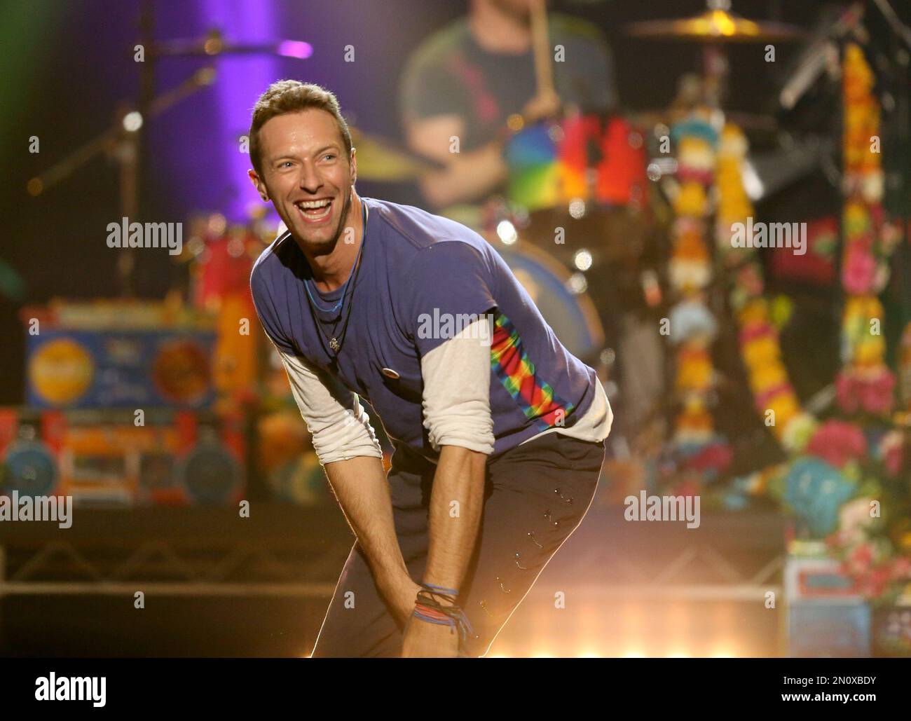 Chris Martin of Coldplay performs at the American Music Awards at the ...