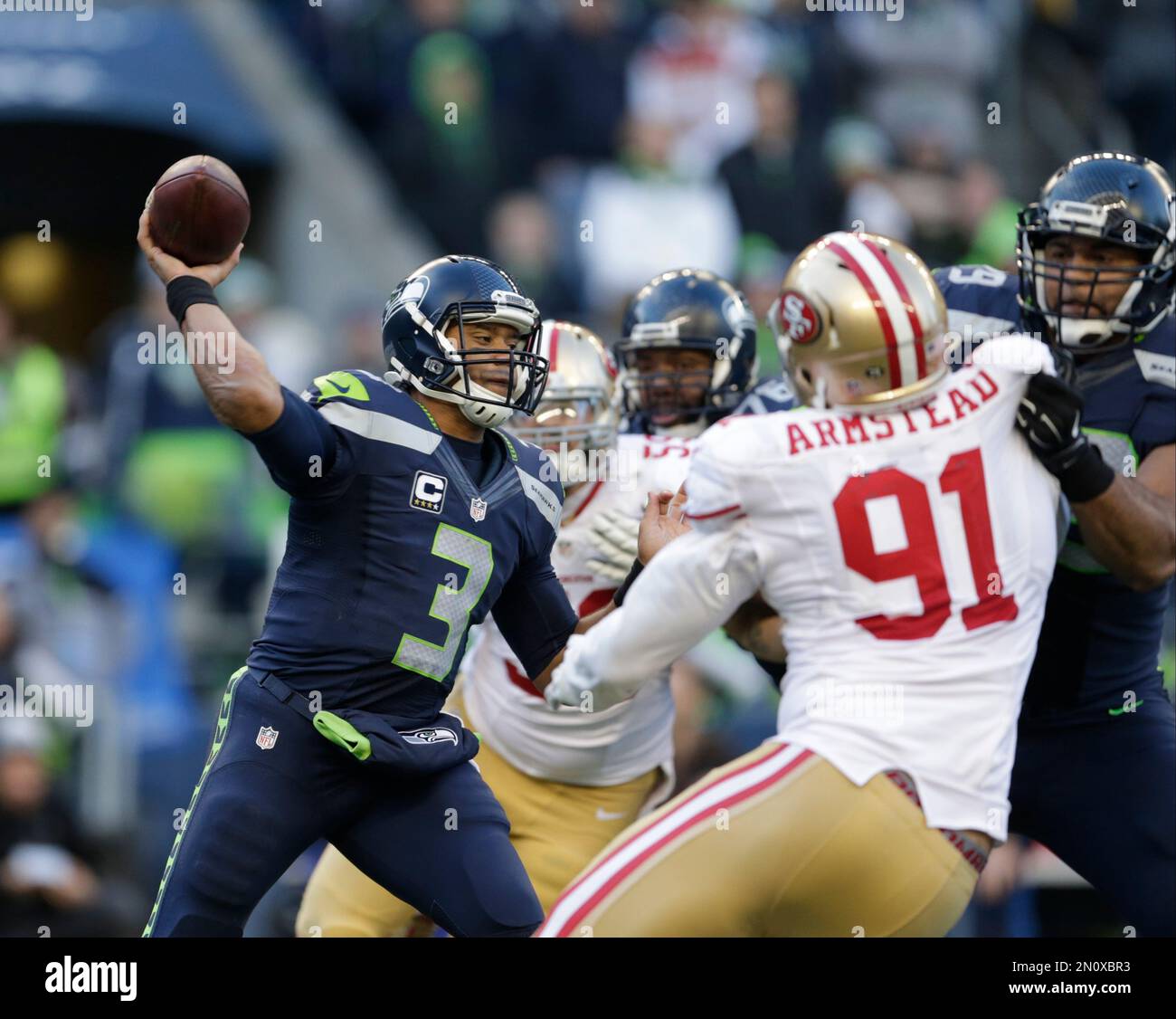 Seattle Seahawks quarterback Russell Wilson (3) passes under pressure ...