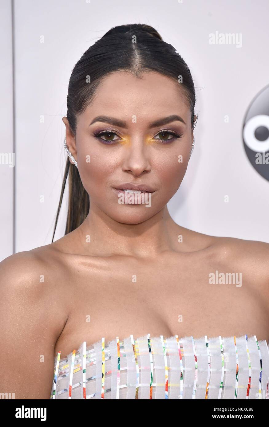 Kat Graham arrives at the American Music Awards at the Microsoft ...