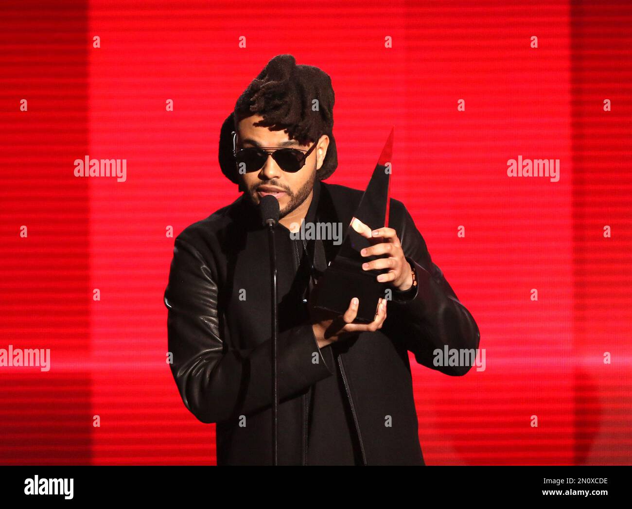 The Weeknd accepts the award for favorite album - soul/R&B for “Beauty ...
