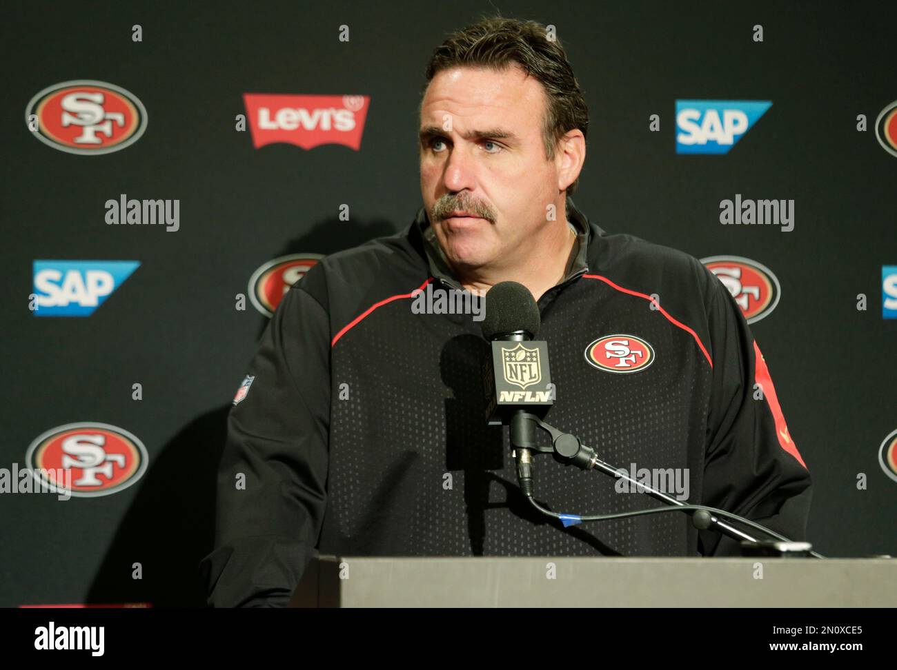 San Francisco 49ers head coach Jim Tomsula talks to reporters after an ...