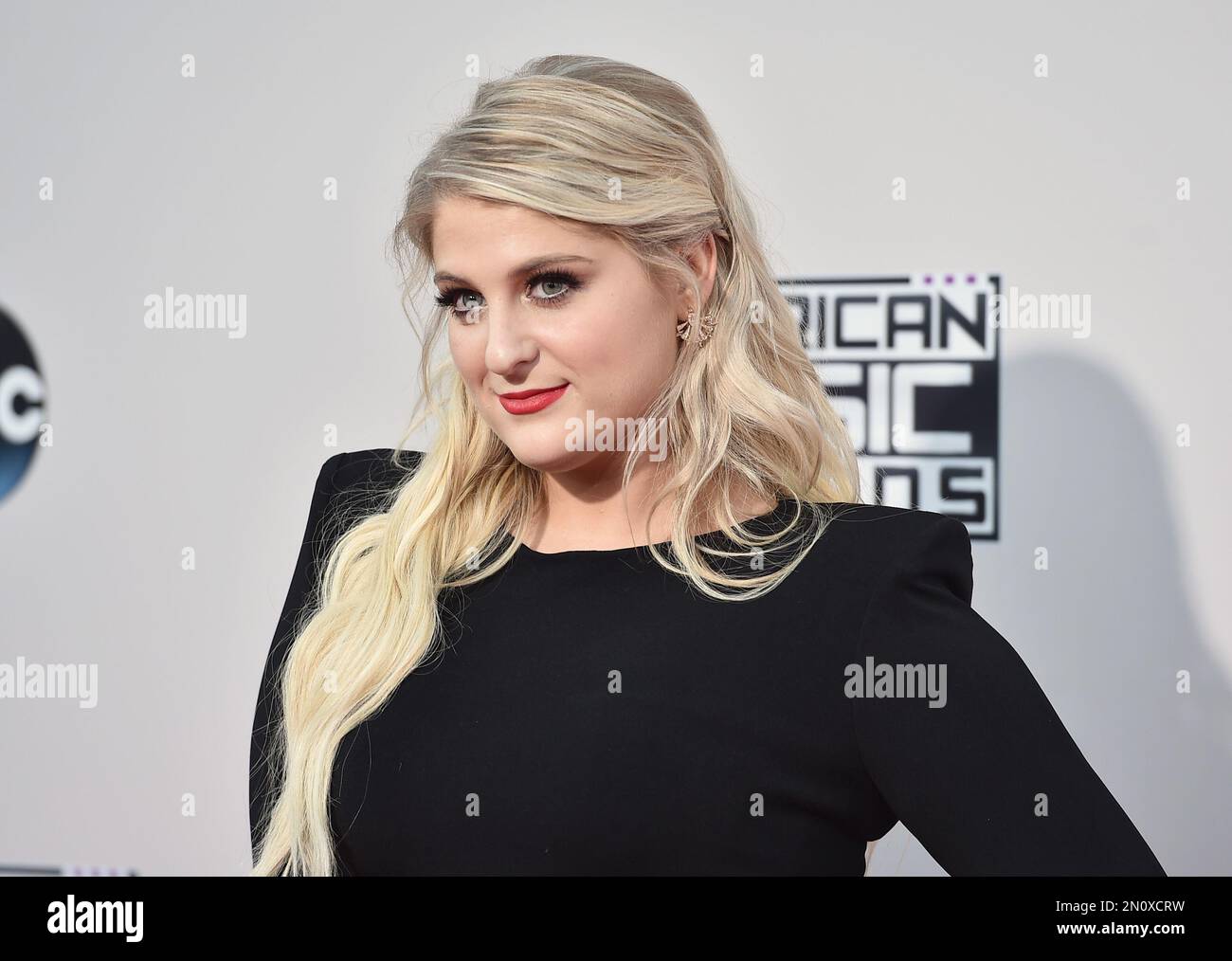 Meghan Trainor arrives at the American Music Awards at the Microsoft ...
