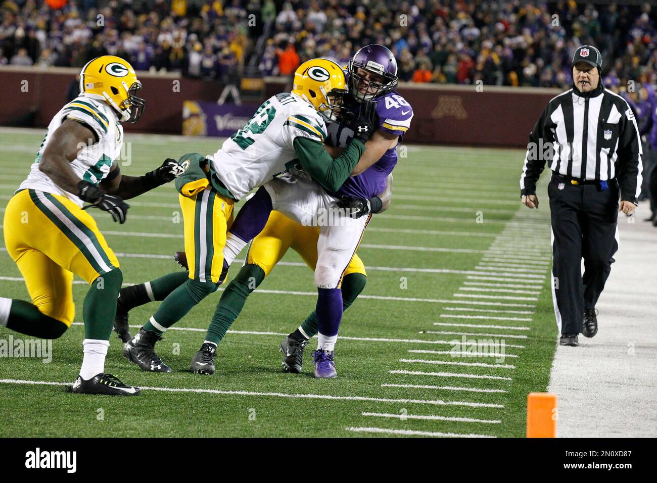 Green Bay Packers cornerback Chris Banjo (32) tackles Minnesota Vikings ...