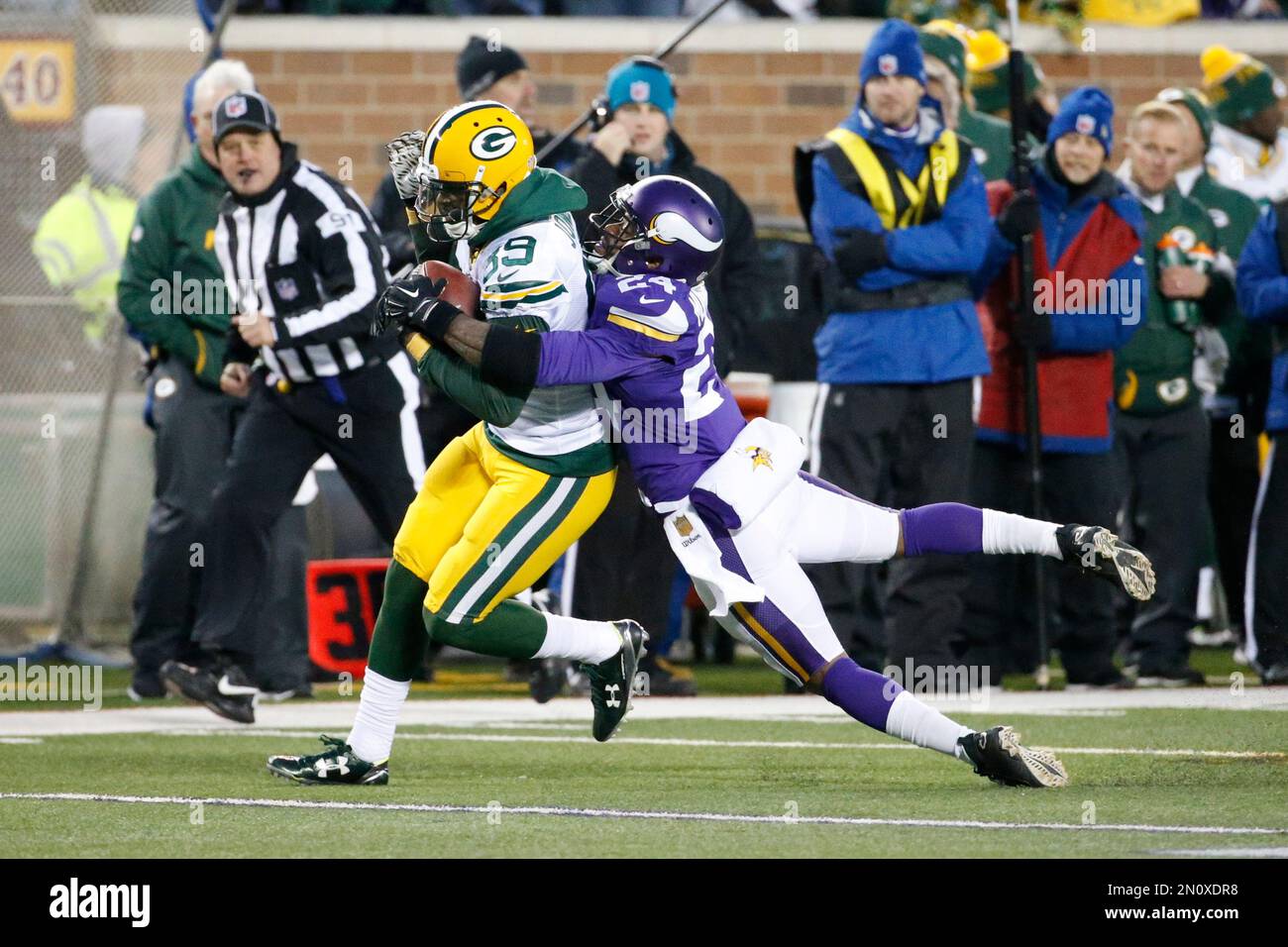 Minnesota Vikings cornerback Captain Munnerlyn (24) tackles Green Bay ...