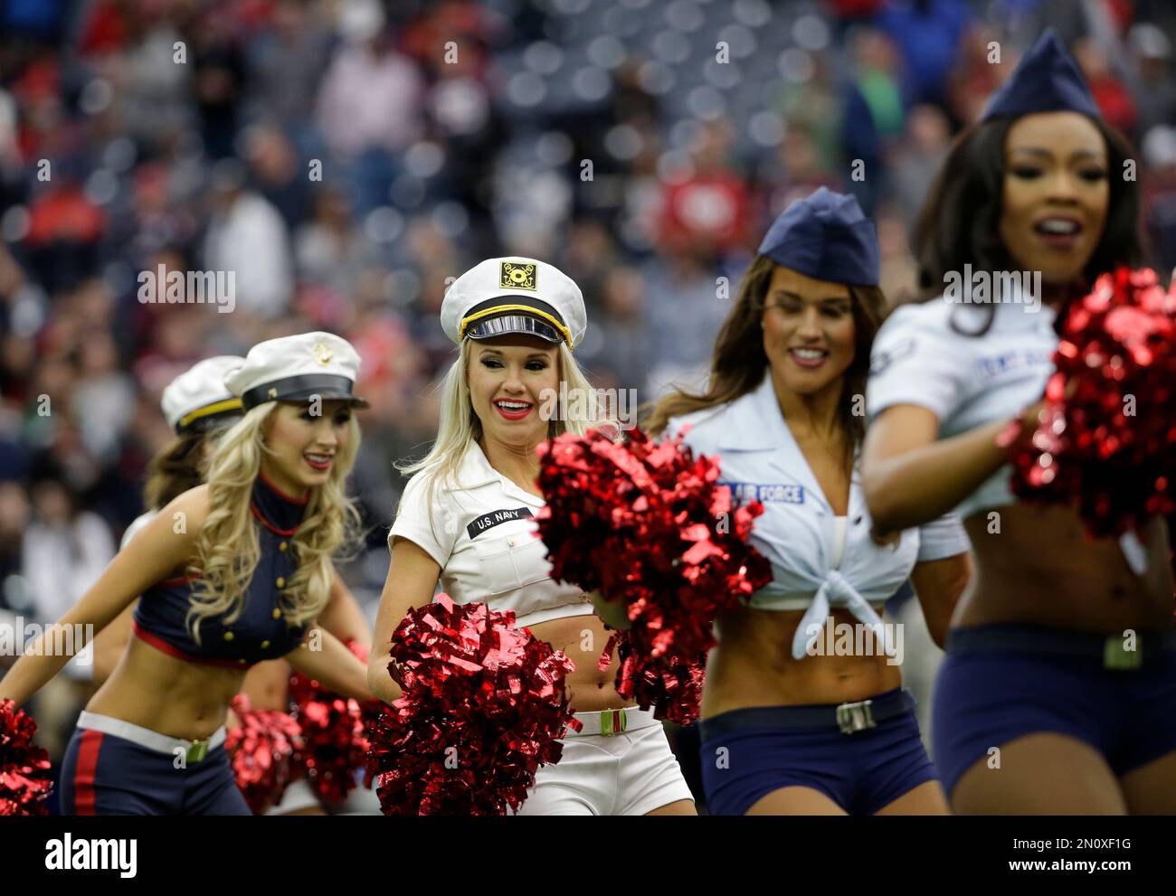 The Houston Texans cheerleaders wear military uniforms as a Salute to ...