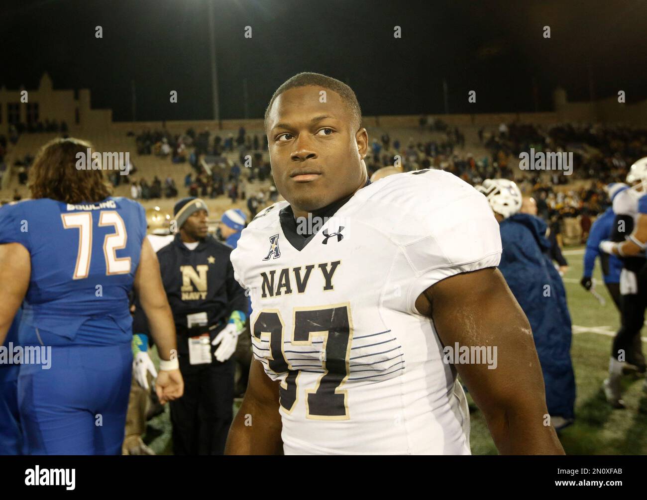 Navy fullback Chris Swain (37) leaves the field after an NCAA college ...