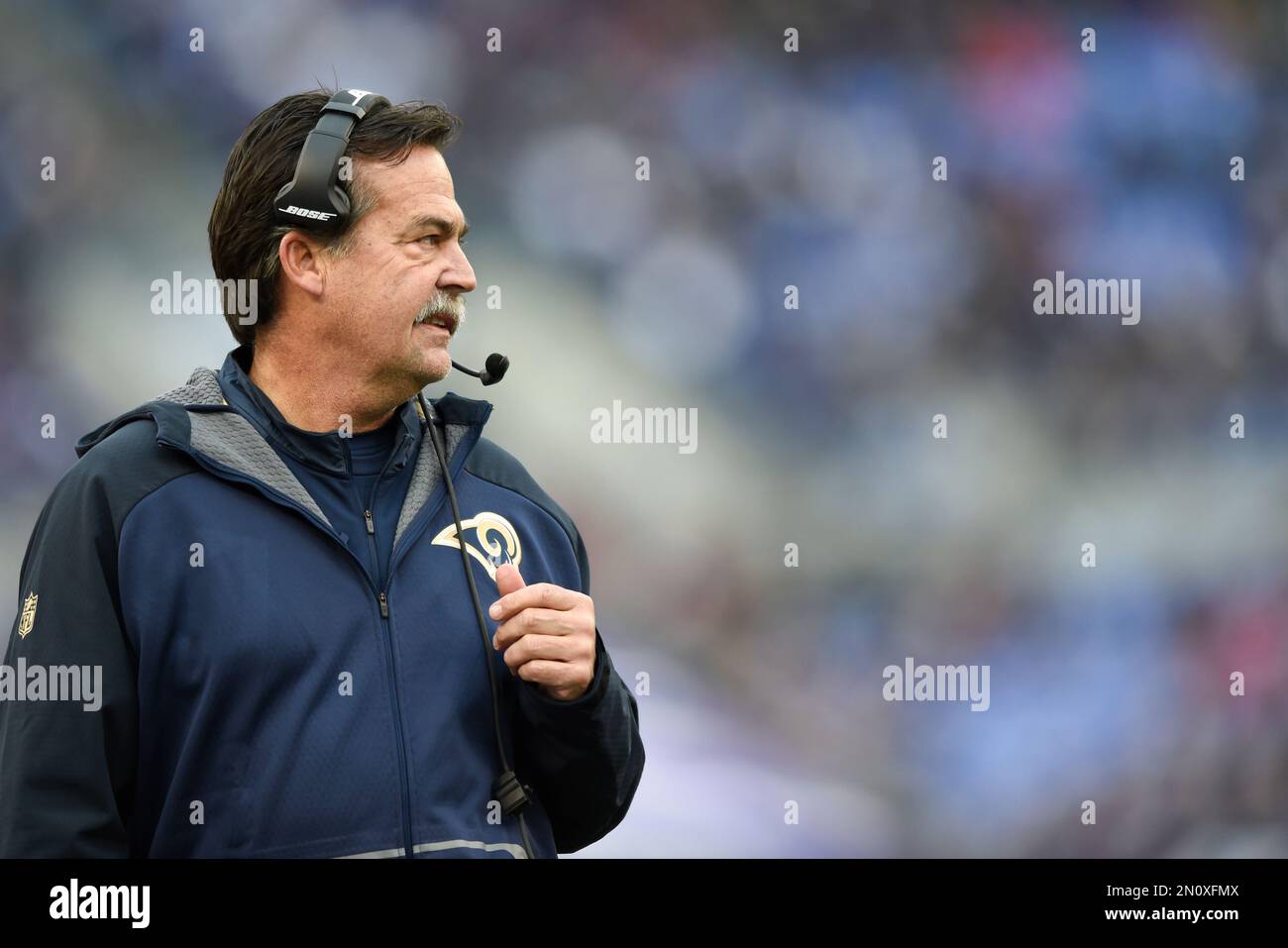St. Louis Rams head coach Jeff Fisher watches the action from the ...