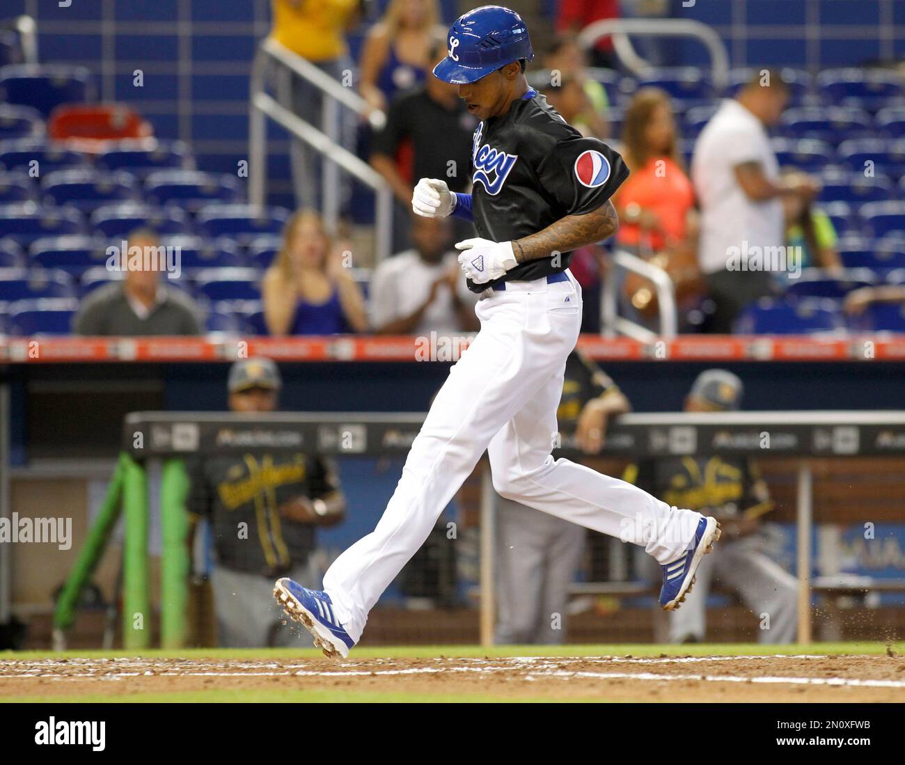 Tigres' Raul Mondesi runs to score against the Navegantes on a ...