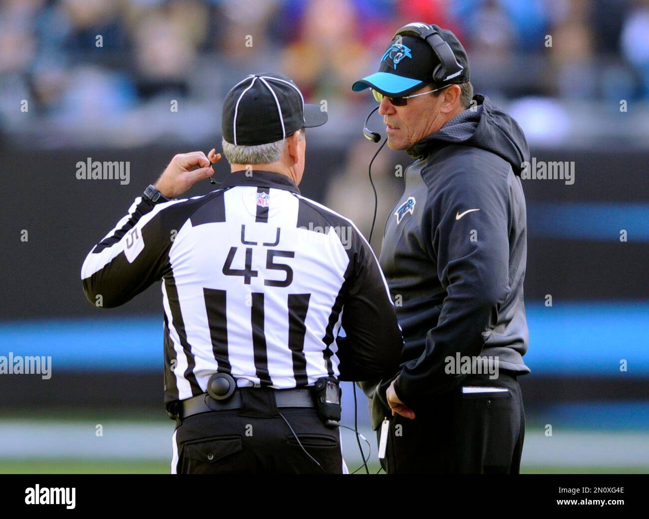 Carolina Panthers head coach Ron Rivera, right, talks with line judge ...