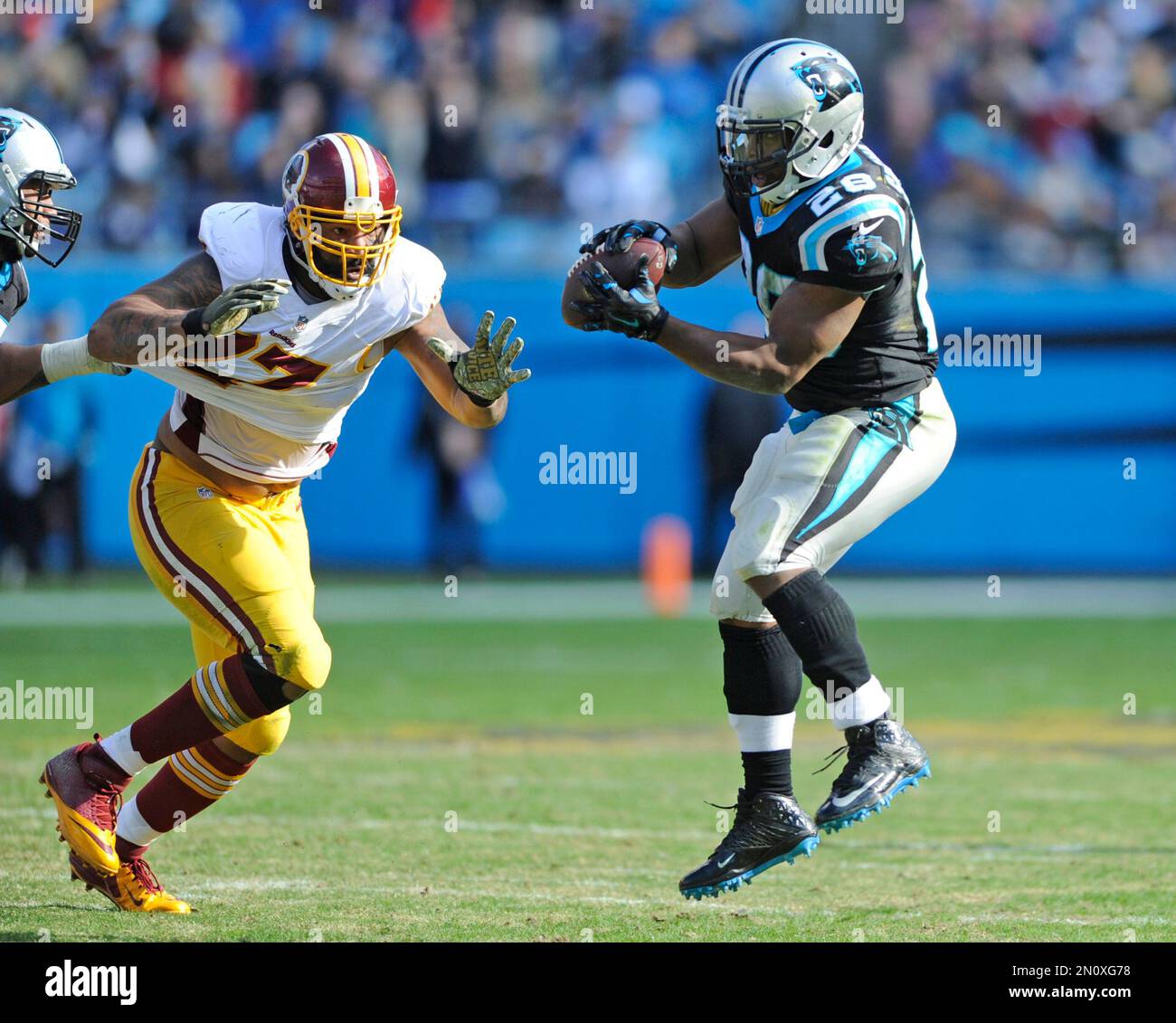 Carolina Panthers' Jonathan Stewart (28) catches a pass in front of ...
