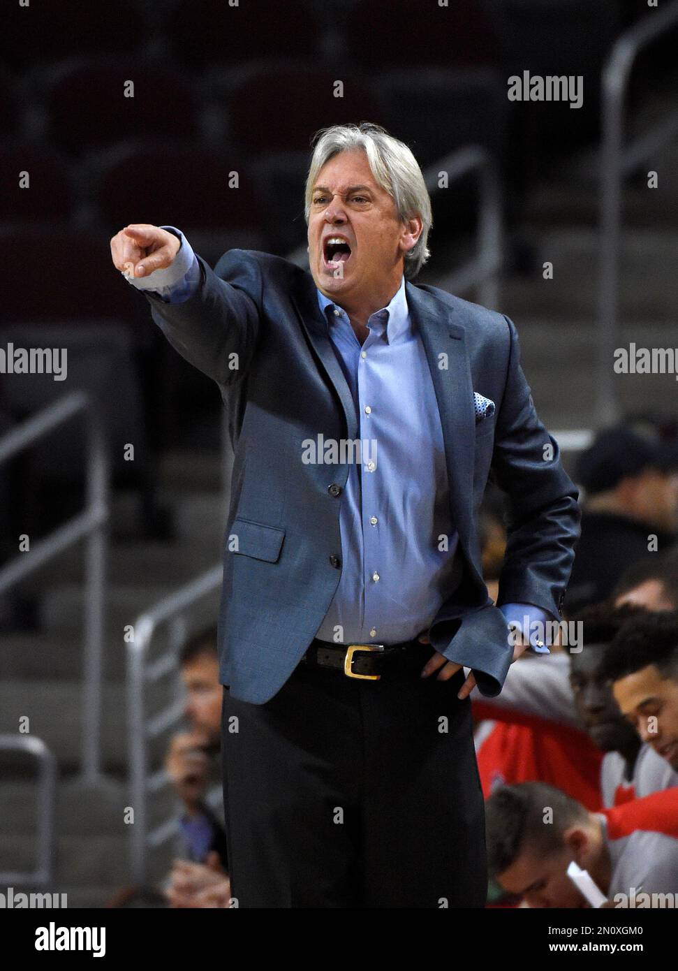 New Mexico head coach Craig Neal yells to his team during the first ...