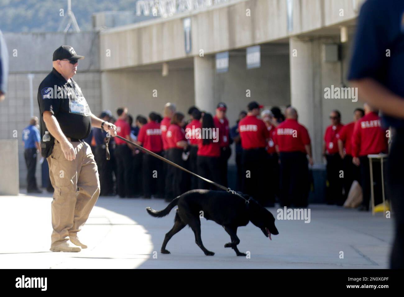 Officials work a security checkpoint before the San Diego Chargers play ...