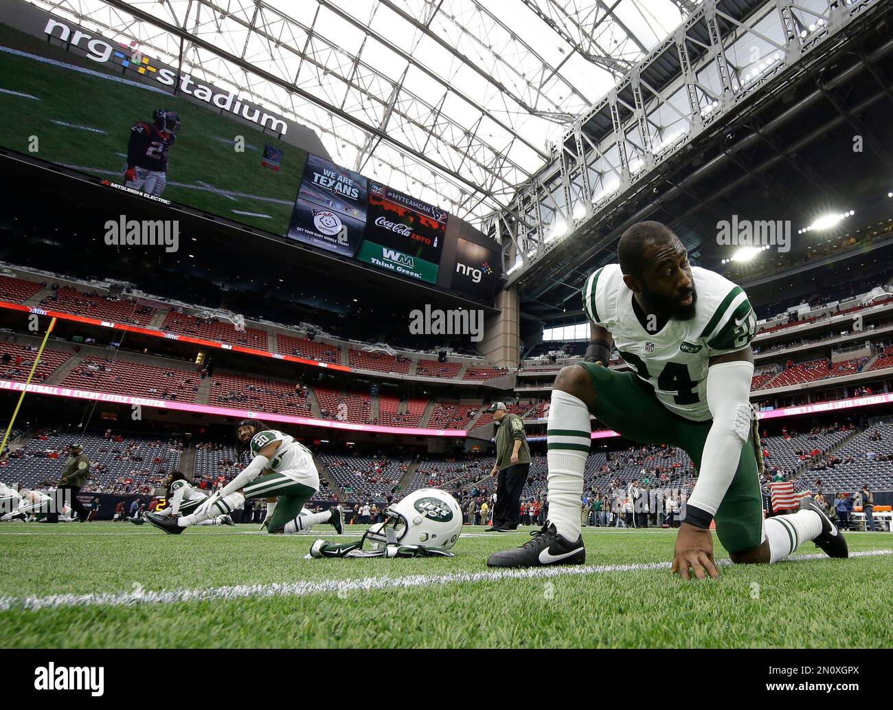 New York Jets cornerback Darrelle Revis (24) stretches prior to an NFL ...